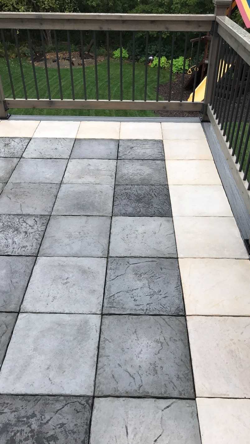 Limestone Border on Cobblestone Gray Deck | DekTekTile - Precast ...
